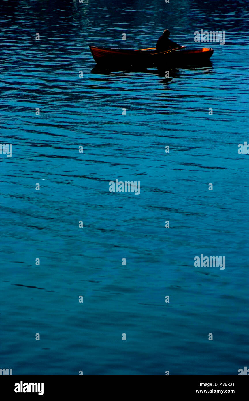 Man in rowboat hi-res stock photography and images - Alamy