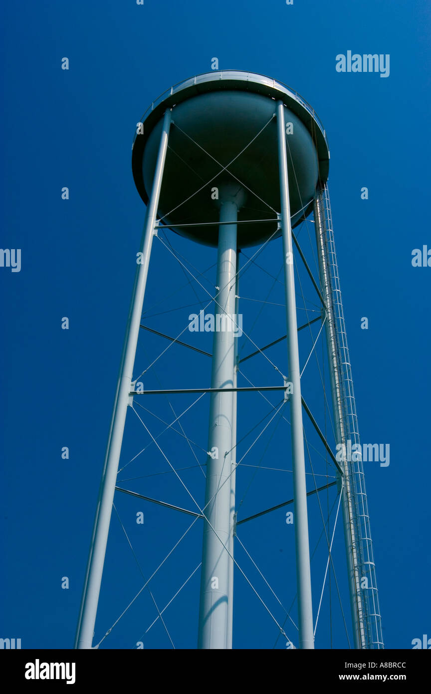 Water storage tower against blue sky Stock Photo - Alamy