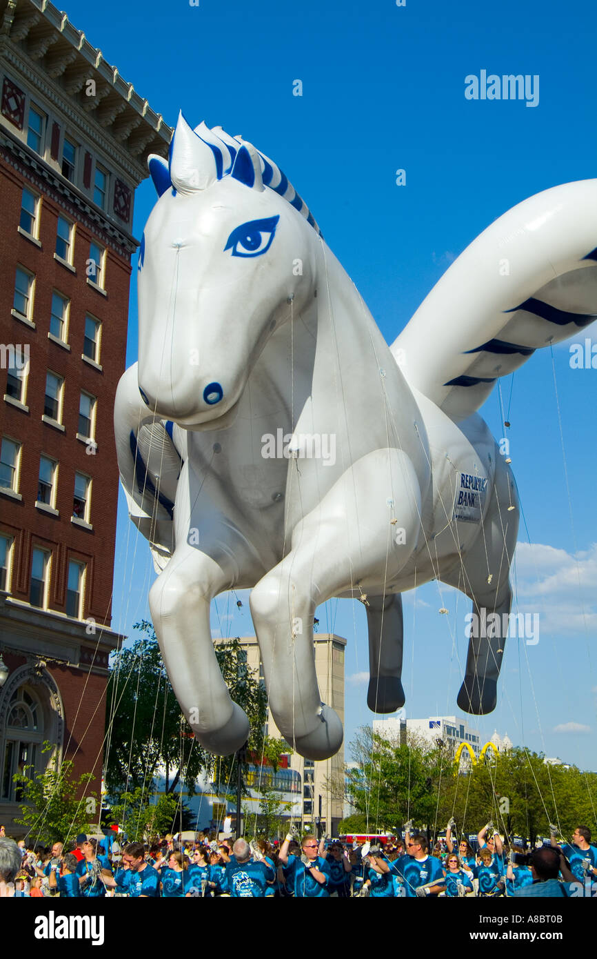 Giant Pegasus balloon in festival parade Stock Photo - Alamy