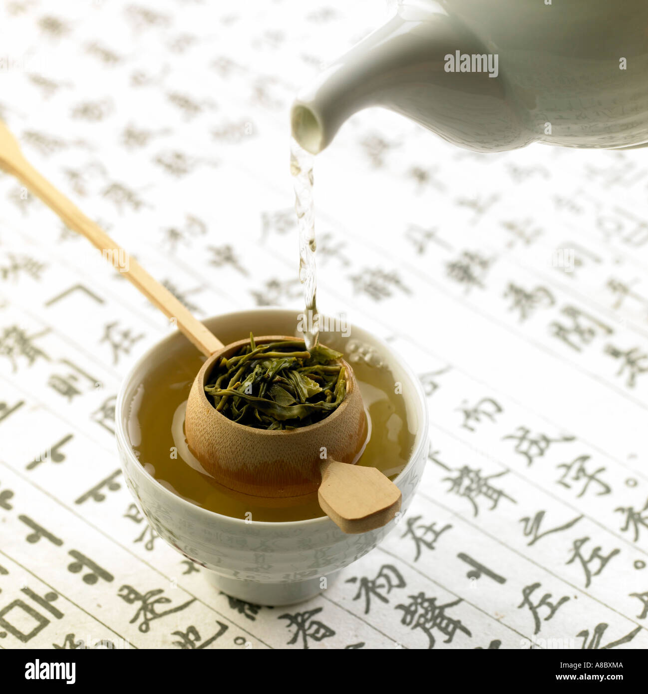 Tea brewing teapot and utensil art of tea making Stock Photo - Alamy