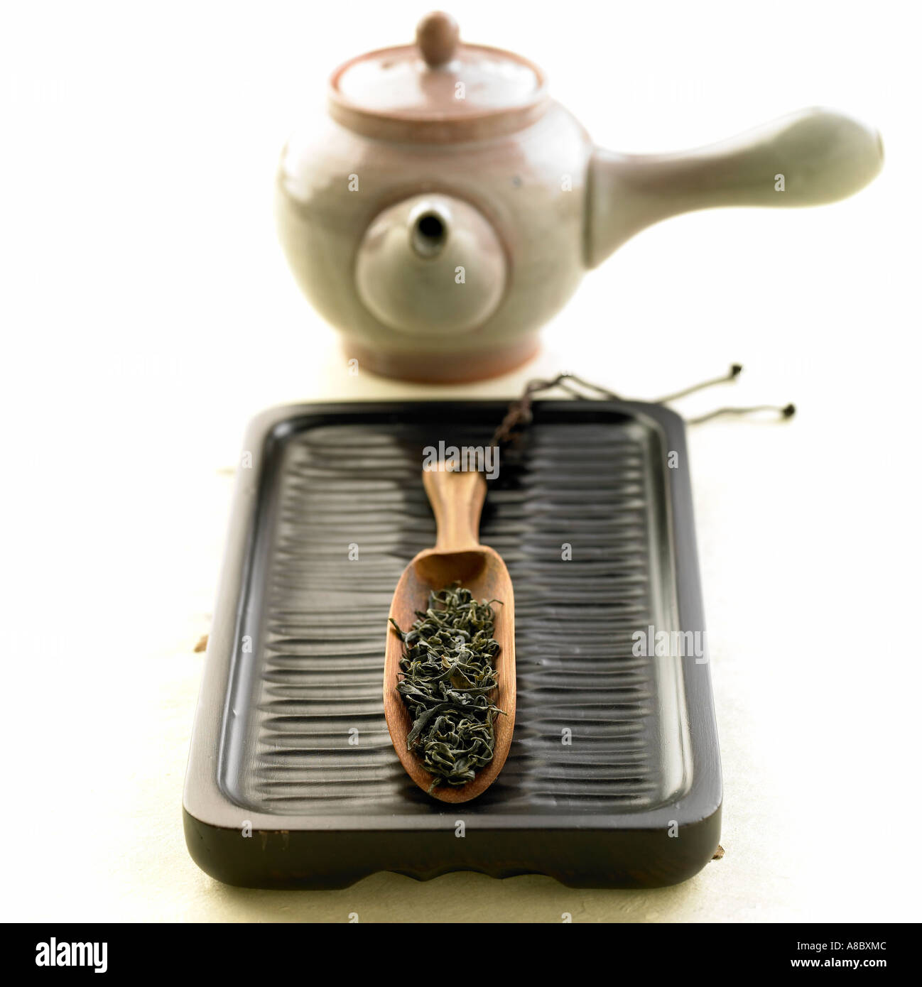 Tea digger and tea tray and tea cups art of tea making Stock Photo - Alamy