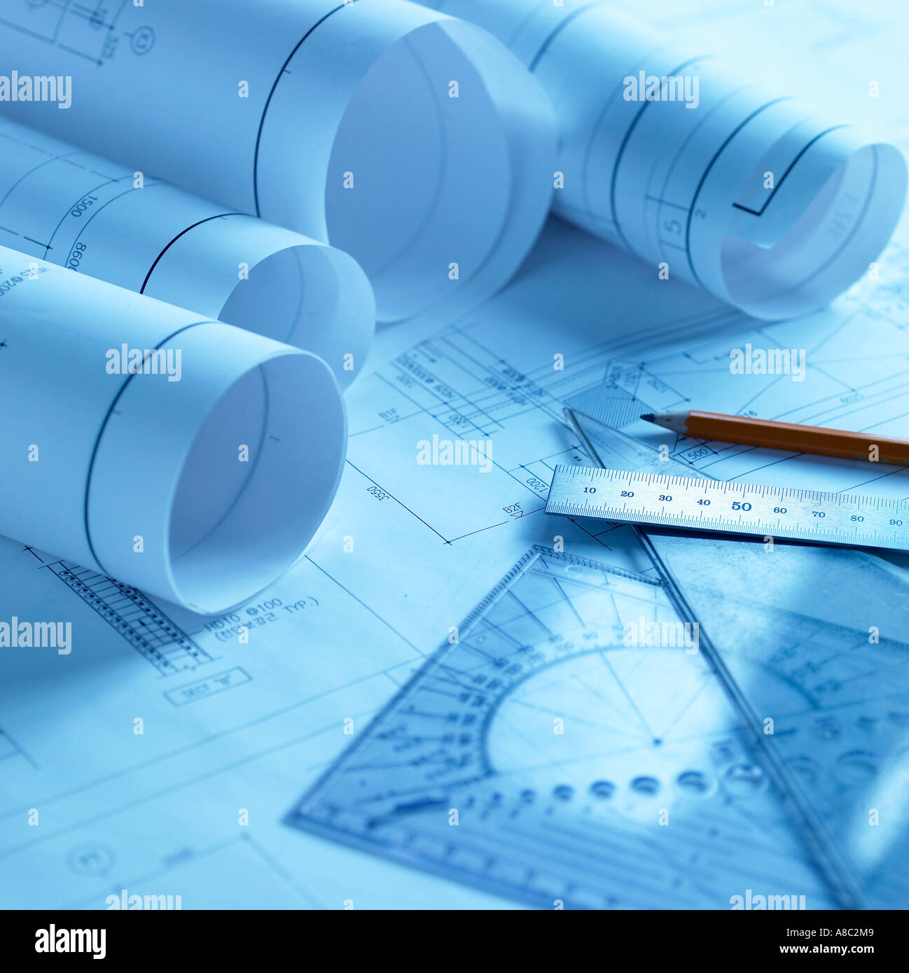 construction a plan and construction tools on a desk Stock Photo - Alamy
