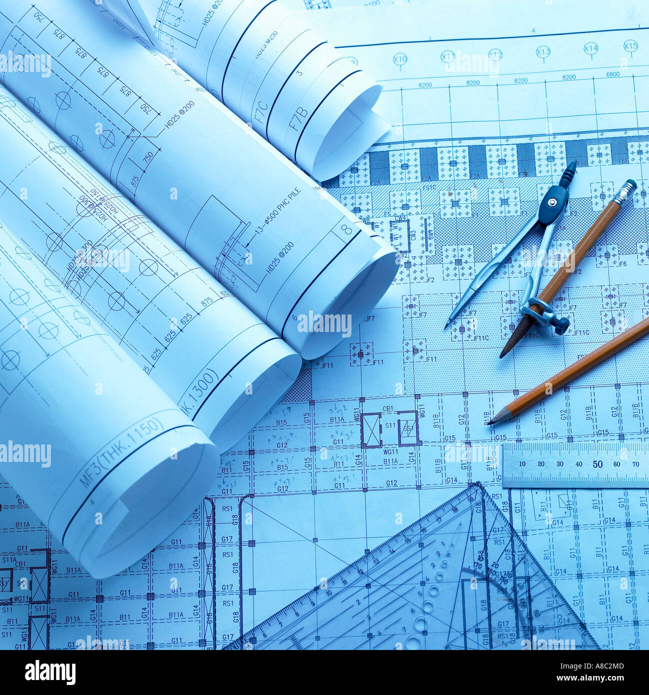 construction a plan and construction tools on a desk Stock Photo - Alamy