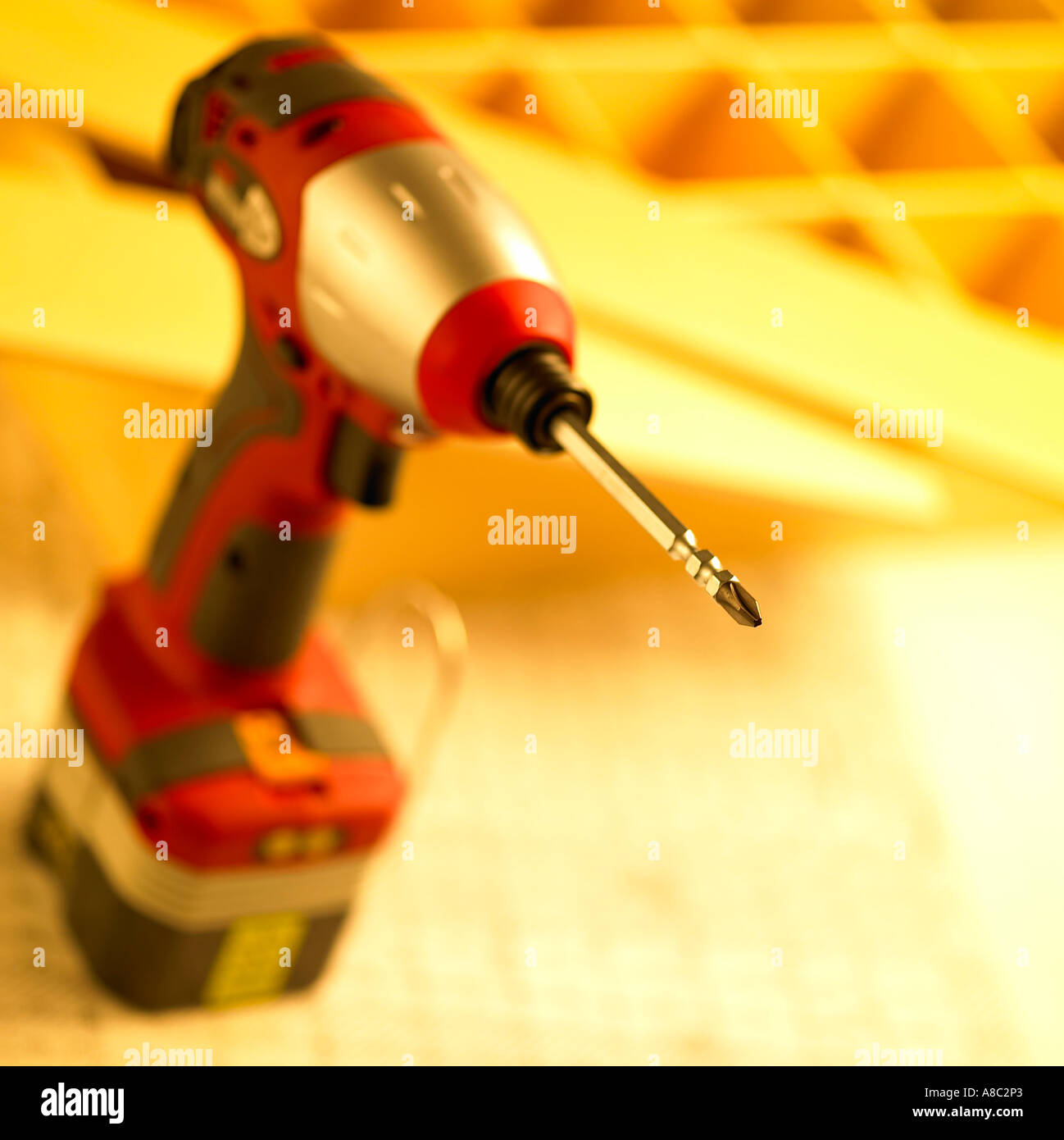 construction an electric drill on a desk Stock Photo - Alamy