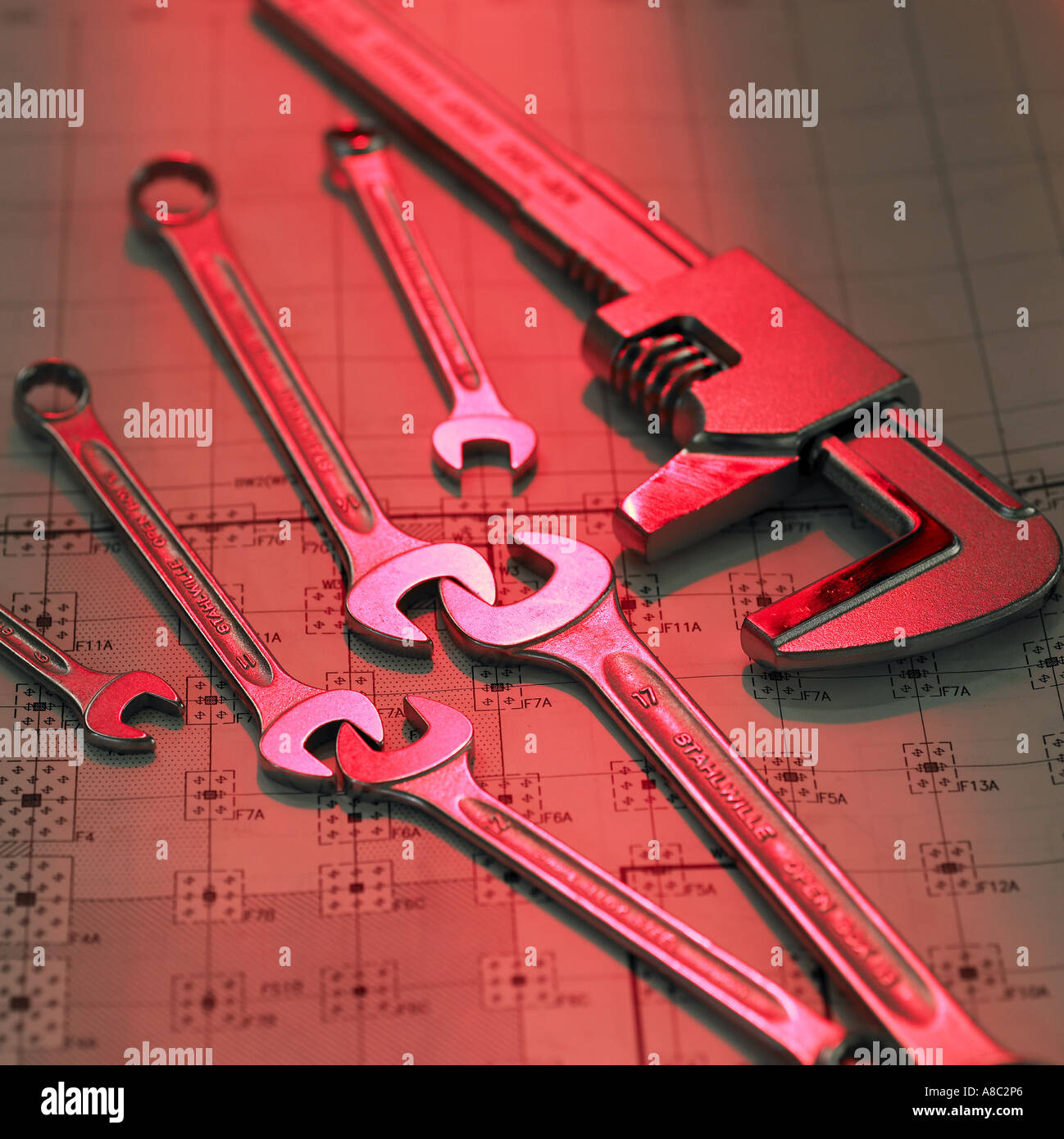 construction a plan and construction tools on a desk Stock Photo - Alamy