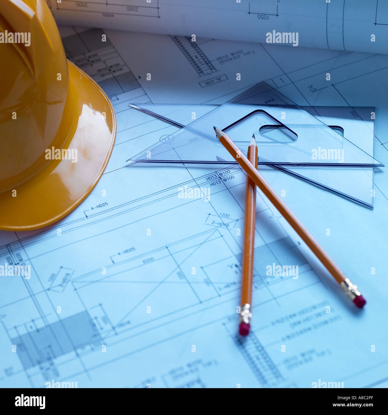 construction a plan and construction tools on a desk Stock Photo - Alamy