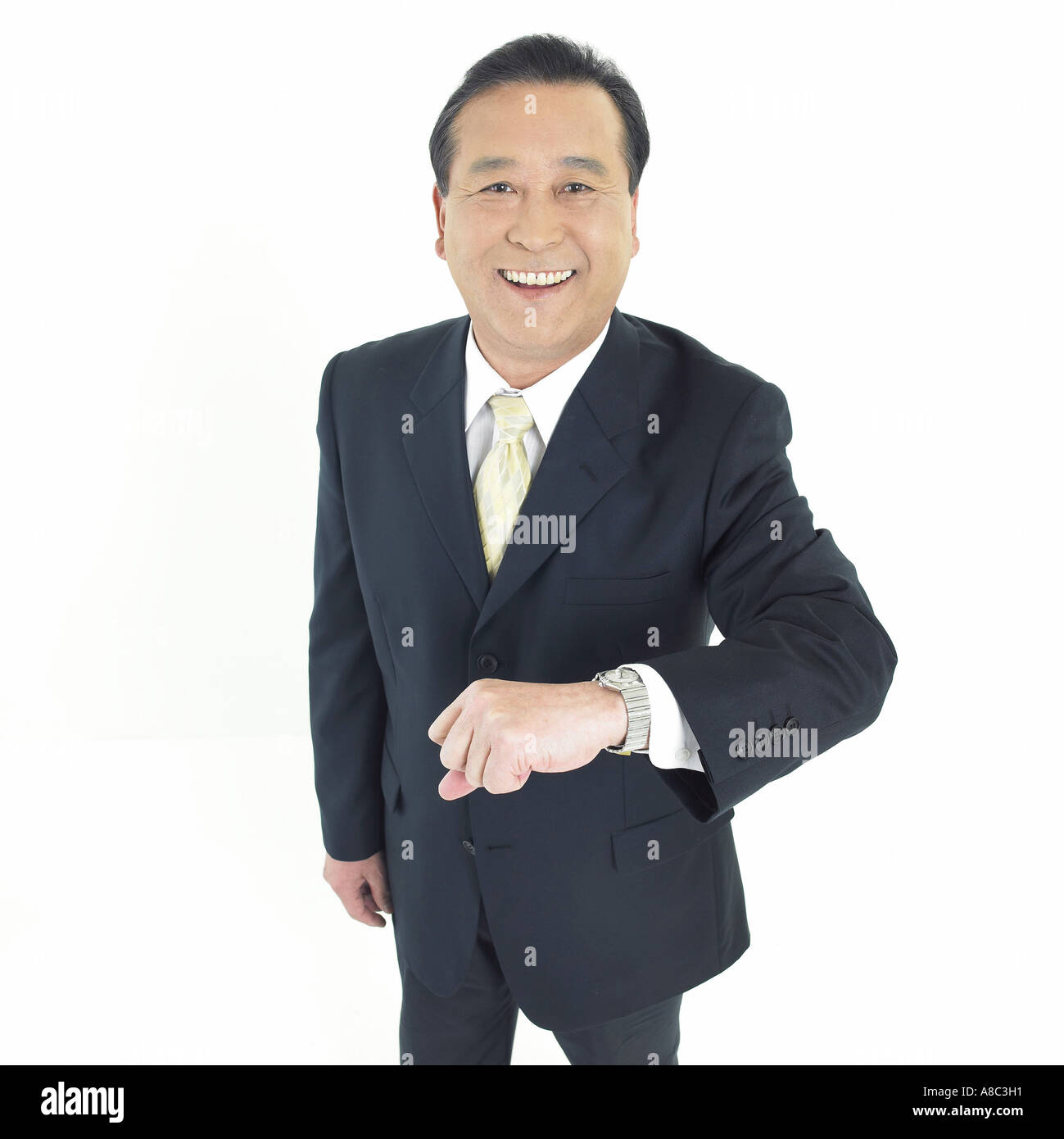 Old man checking wrist watch hi-res stock photography and images - Alamy