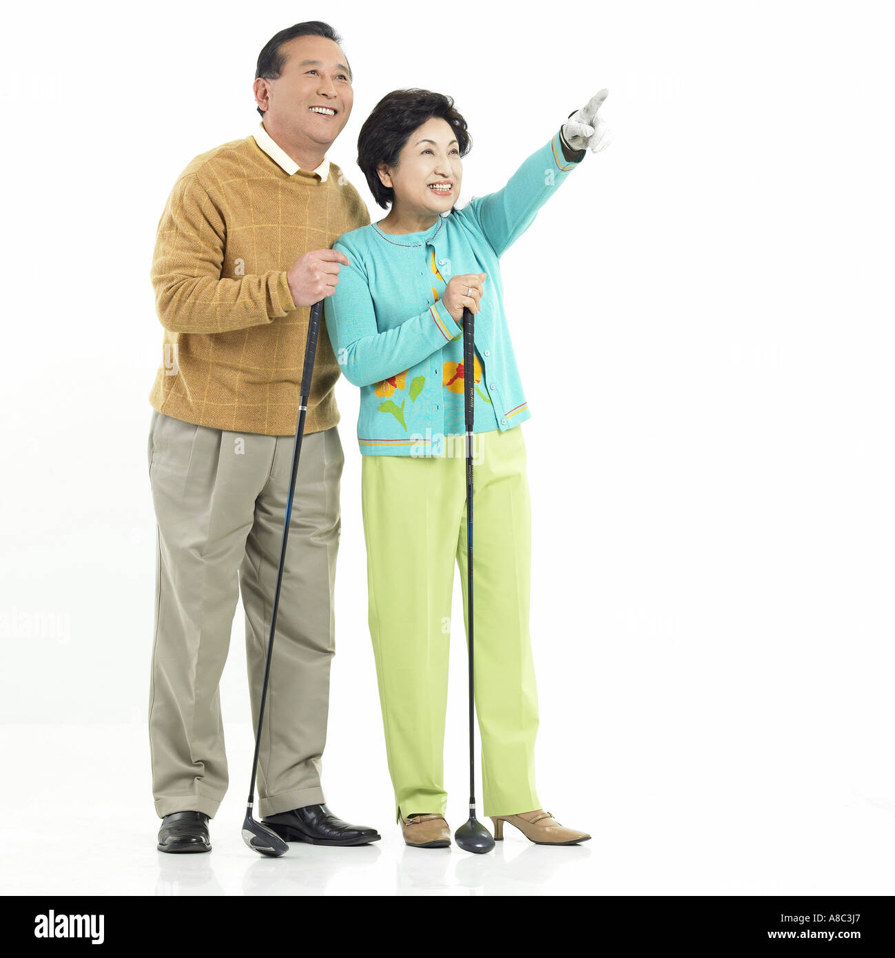 Family an old couple pointing at something Stock Photo - Alamy