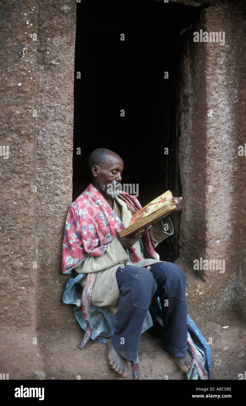 Man reading bible outside hi-res stock photography and images - Alamy