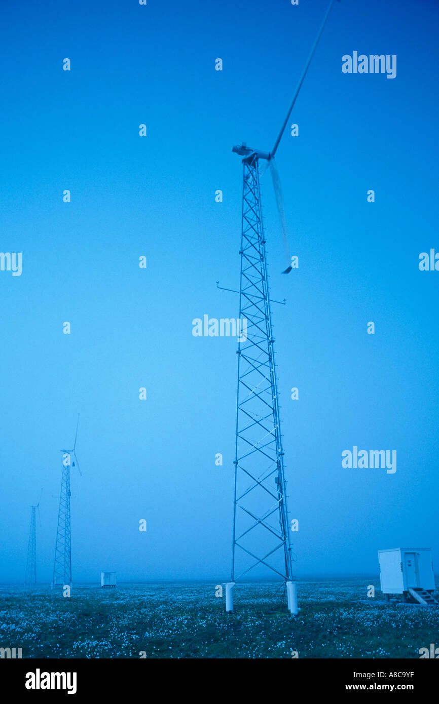 Wind powered generator fans in fog Summer USA Stock Photo - Alamy
