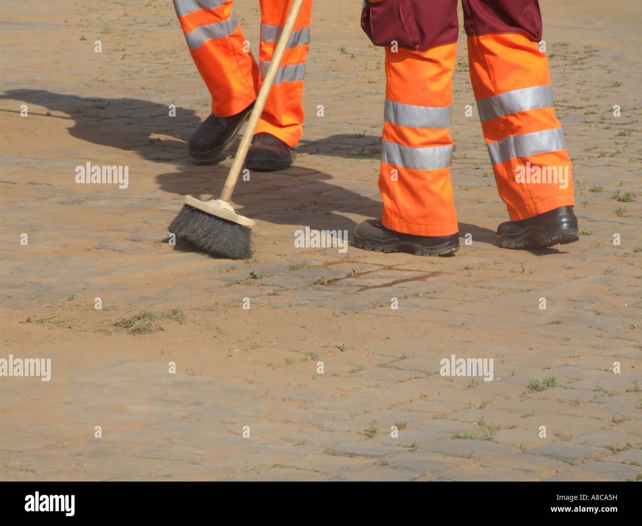 person cleaning road Stock Photo - Alamy