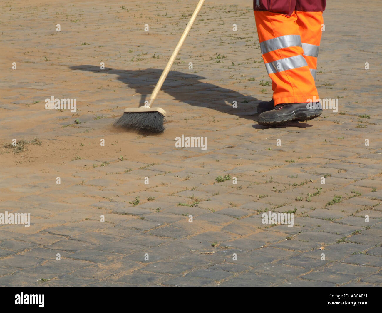 person cleaning road Stock Photo - Alamy