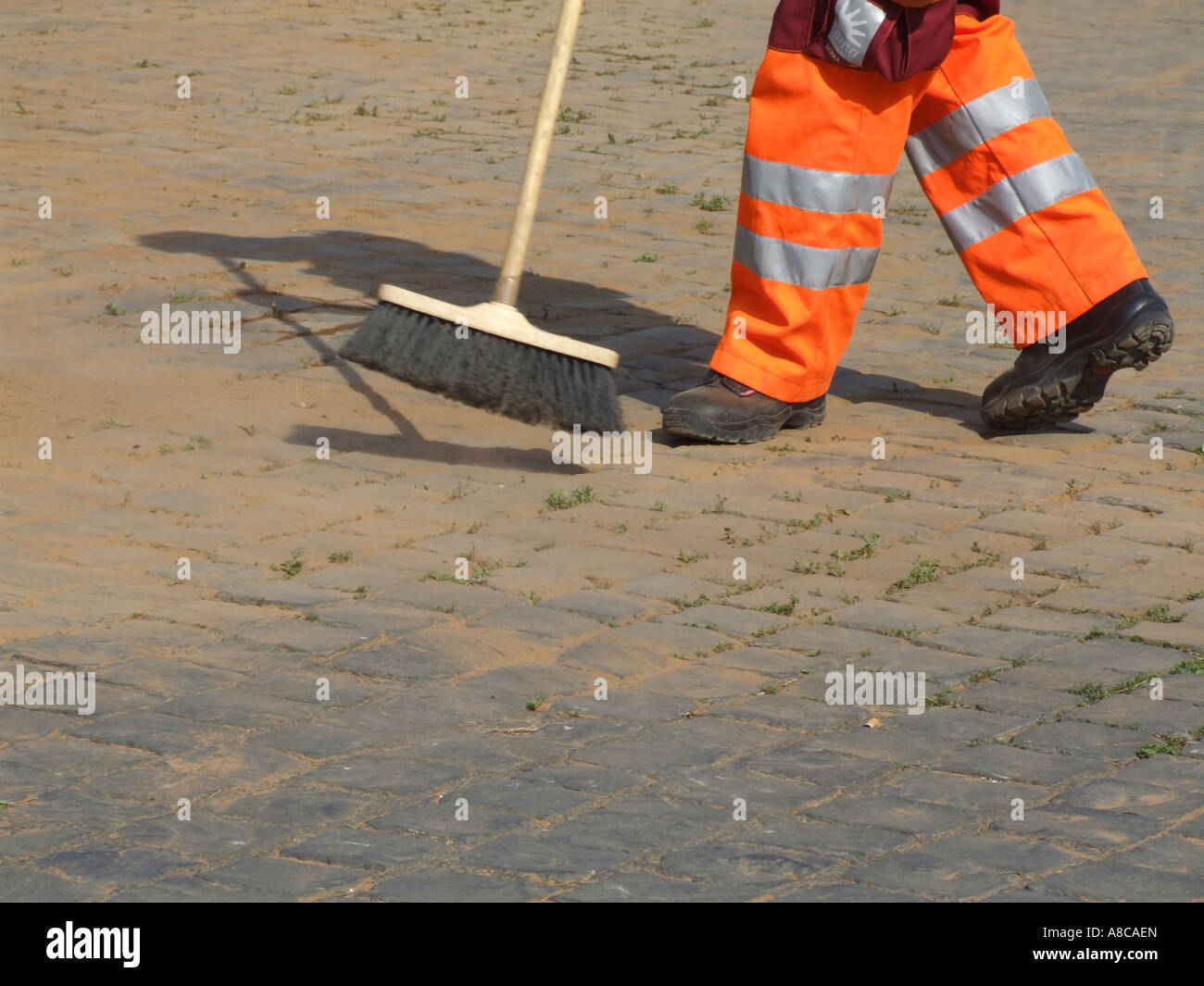 person cleaning road Stock Photo - Alamy