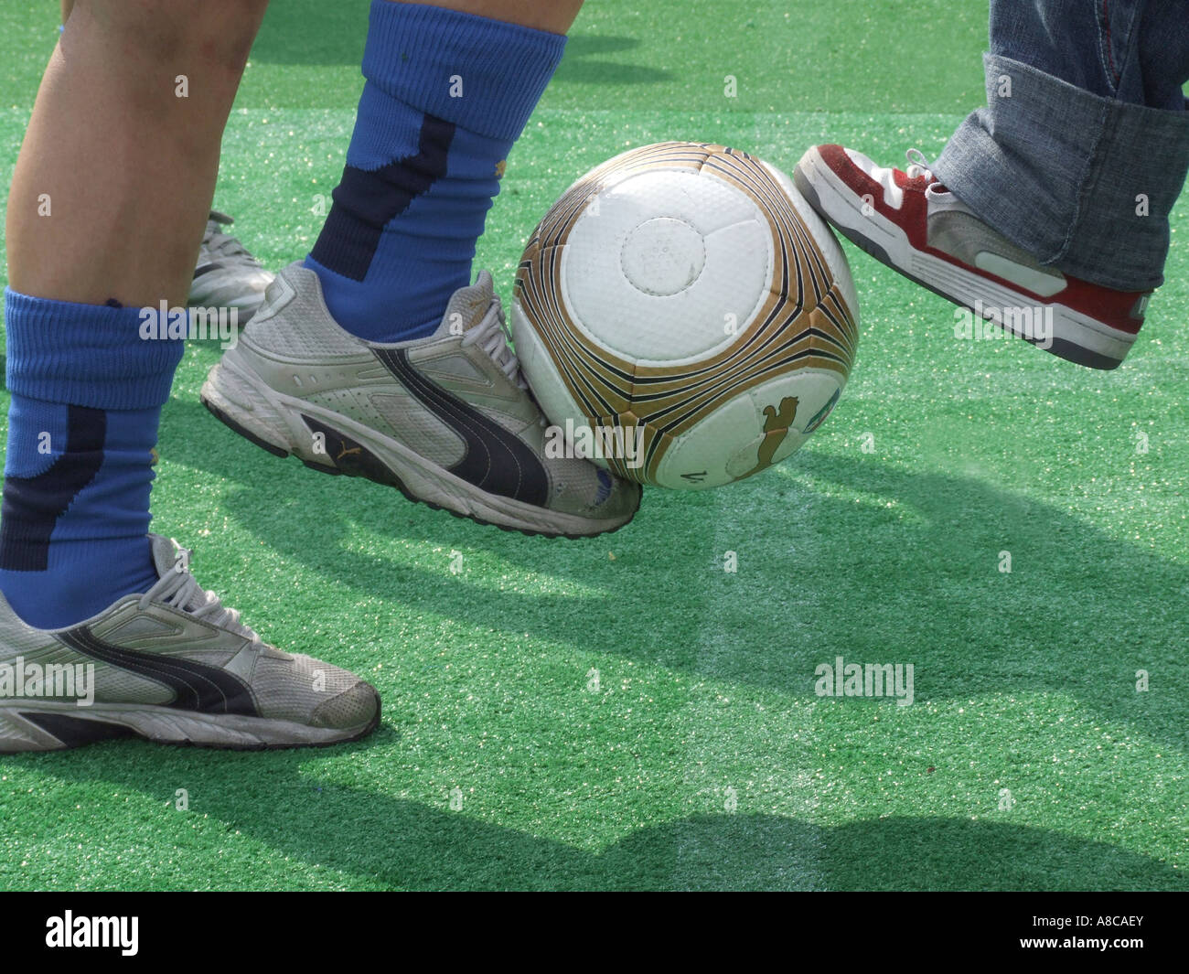football players in action Stock Photo - Alamy
