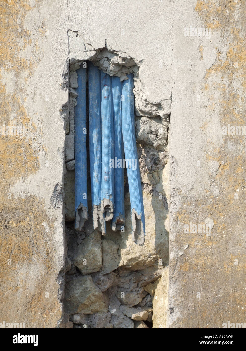 damaged pipes on property wall Stock Photo - Alamy