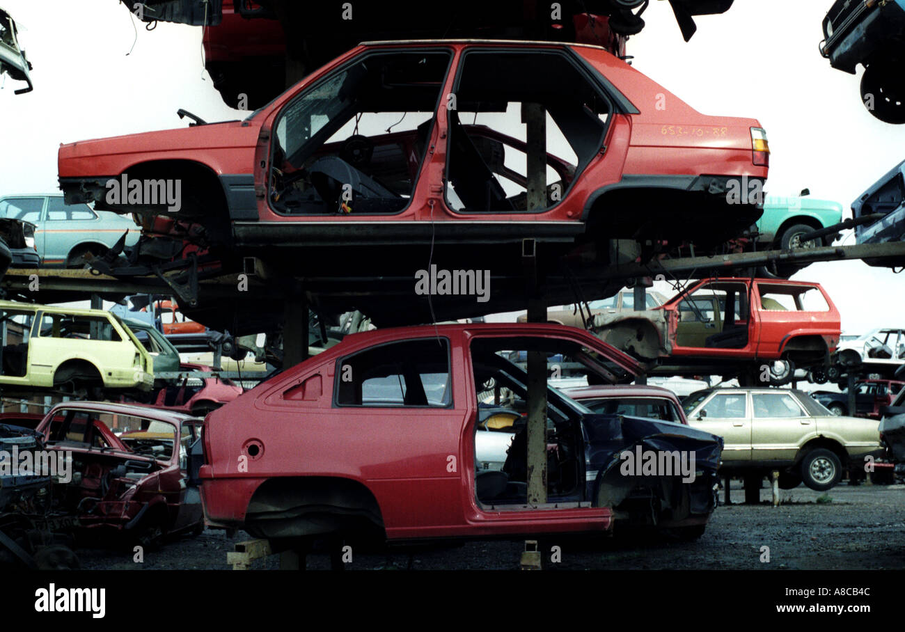 cars in a scrapyard UK Stock Photo - Alamy
