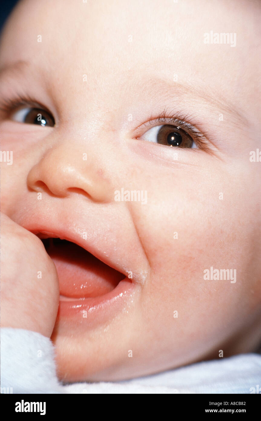 The smiling face of a happy baby boy Stock Photo - Alamy