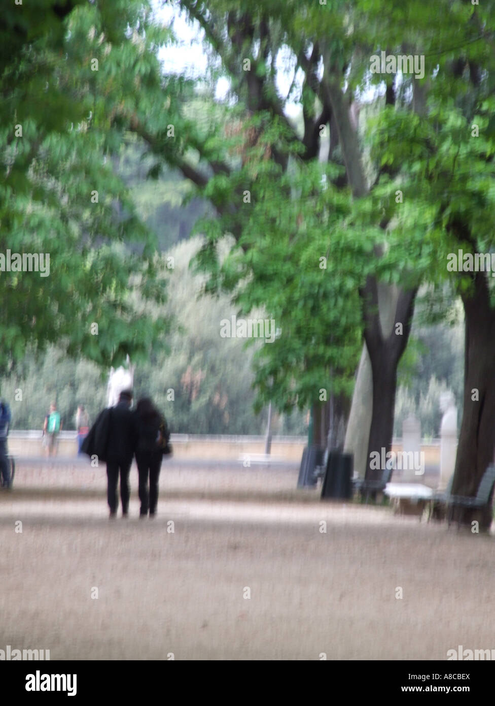 couple holding hands in countryside Stock Photo - Alamy