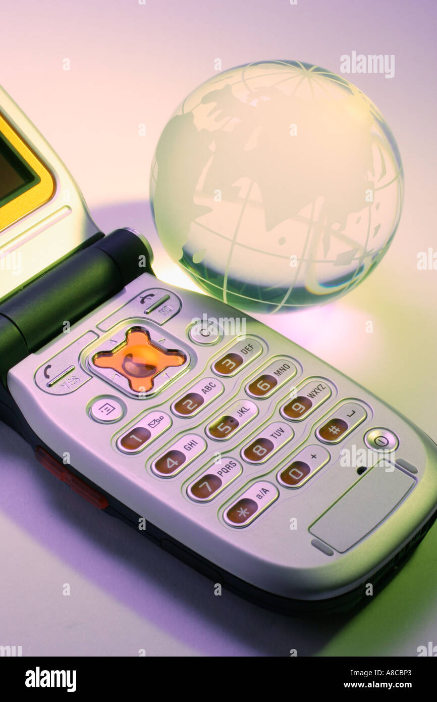 Mobile Phone and Crystal Globe Stock Photo - Alamy