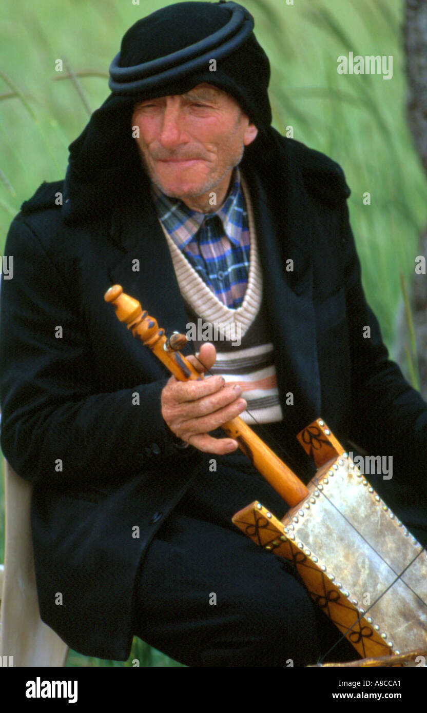 traditional old man playing folk music north lebanon Stock Photo - Alamy