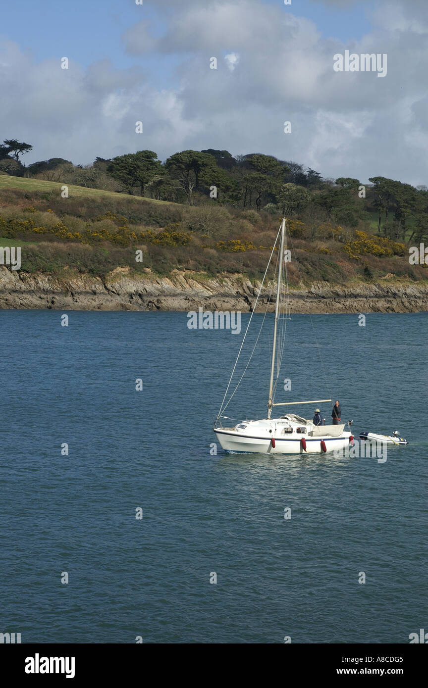 Yacht sailing up Helford river Cornwall England UK United Kingdom GB ...