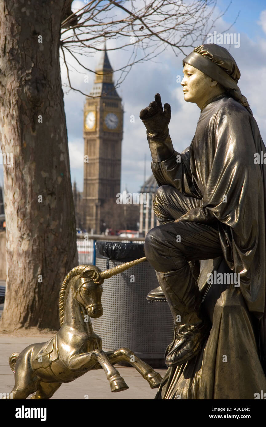 Street performer on the Embankment- Big Ben in background Stock Photo ...