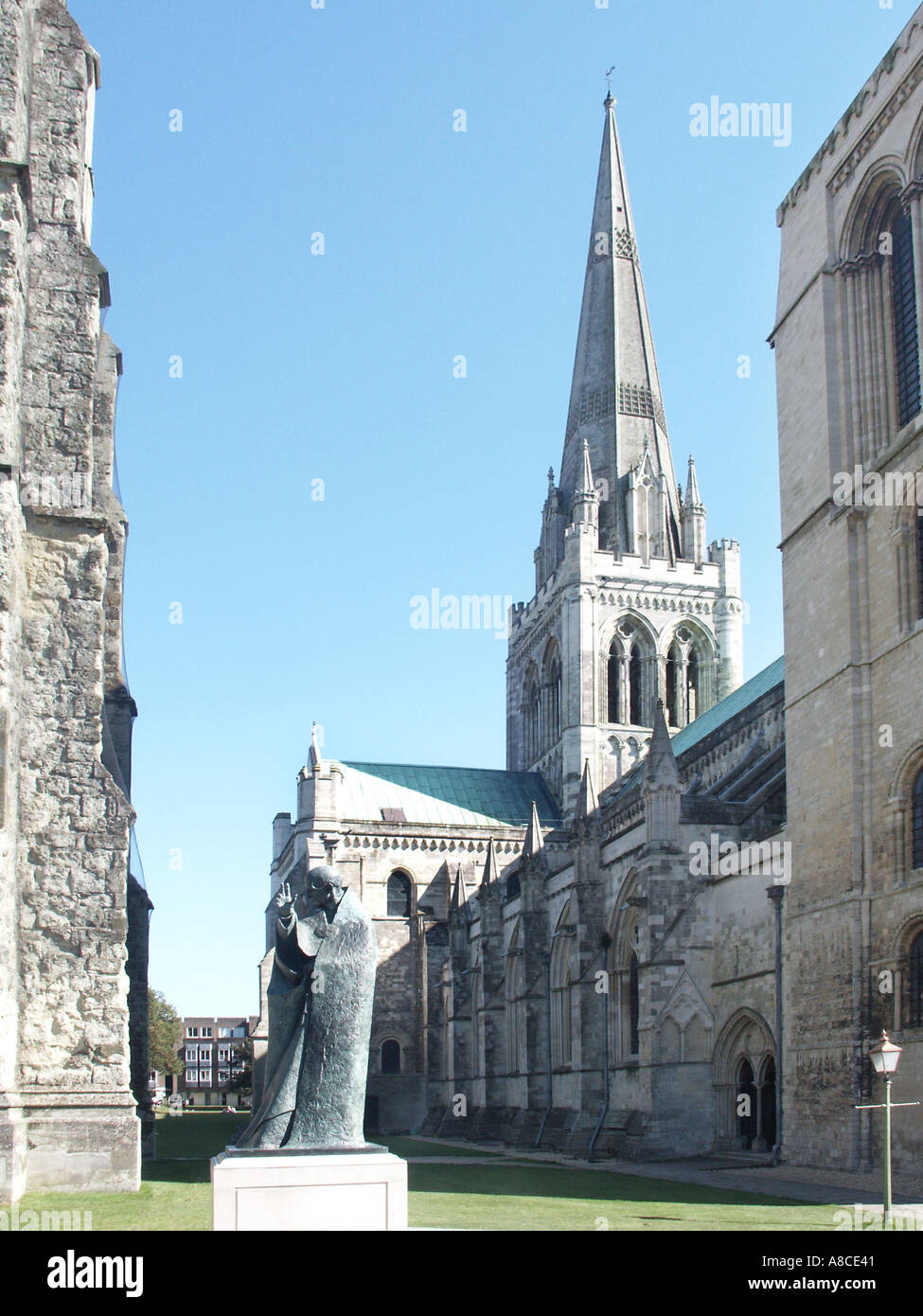 Bronze statue of patron Saint Richard with tower and spire of Anglican ...