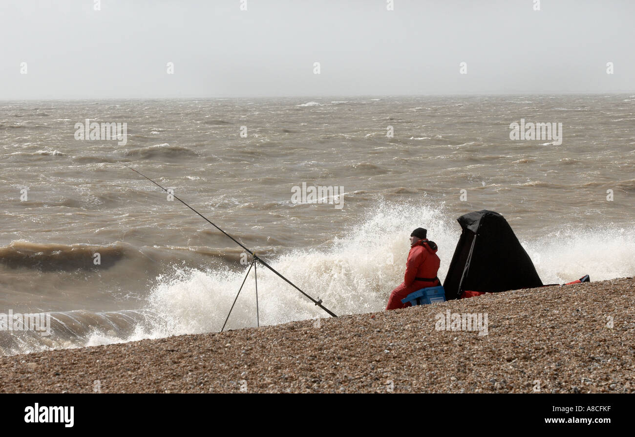 Sea angler with stormy sea Sandgate beach Kent Stock Photo - Alamy