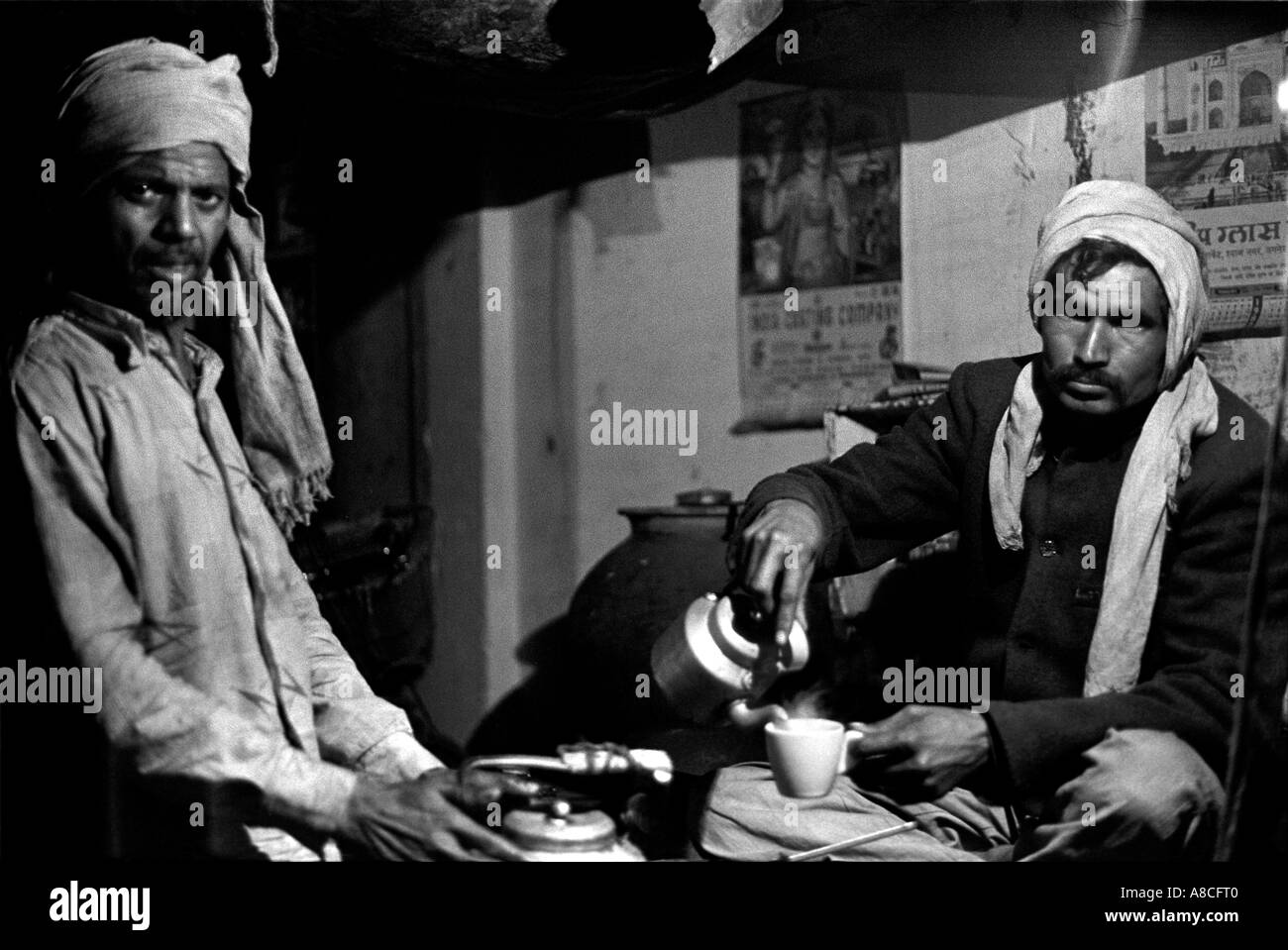 Men making tea at a night stall in Agra, Uttar Pradesh India ...