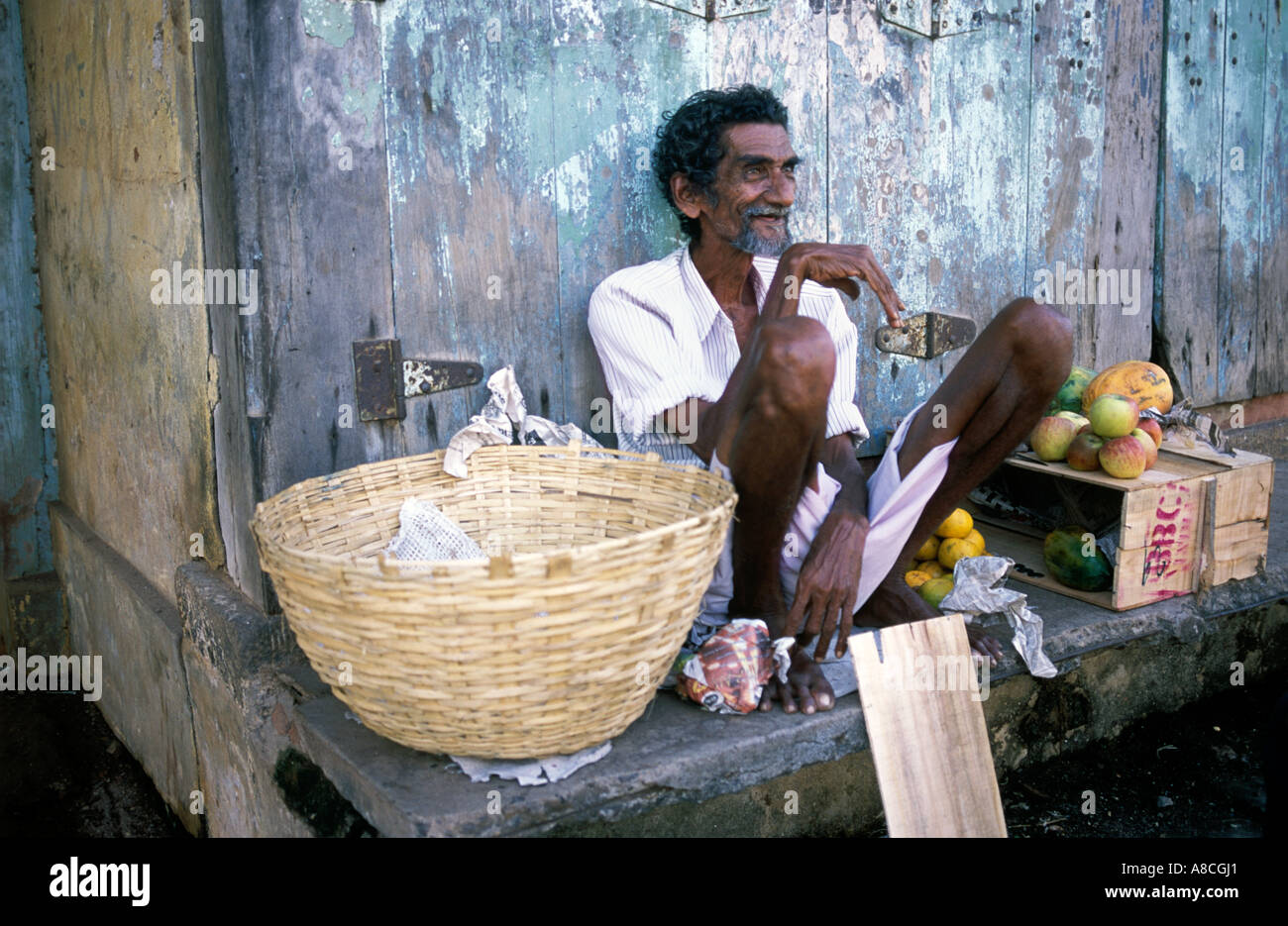 Man selling fruit in Mattancherry, Fort Cochin, Kerala, Southern India ...