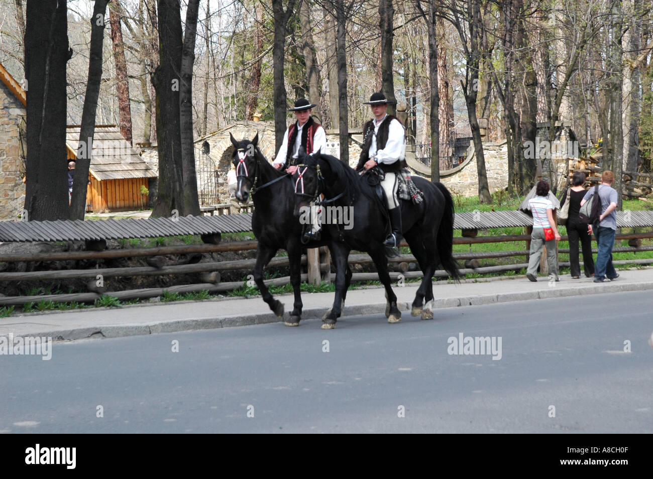 Polish highlanders wearing traditional clothes riding Stock Photo - Alamy