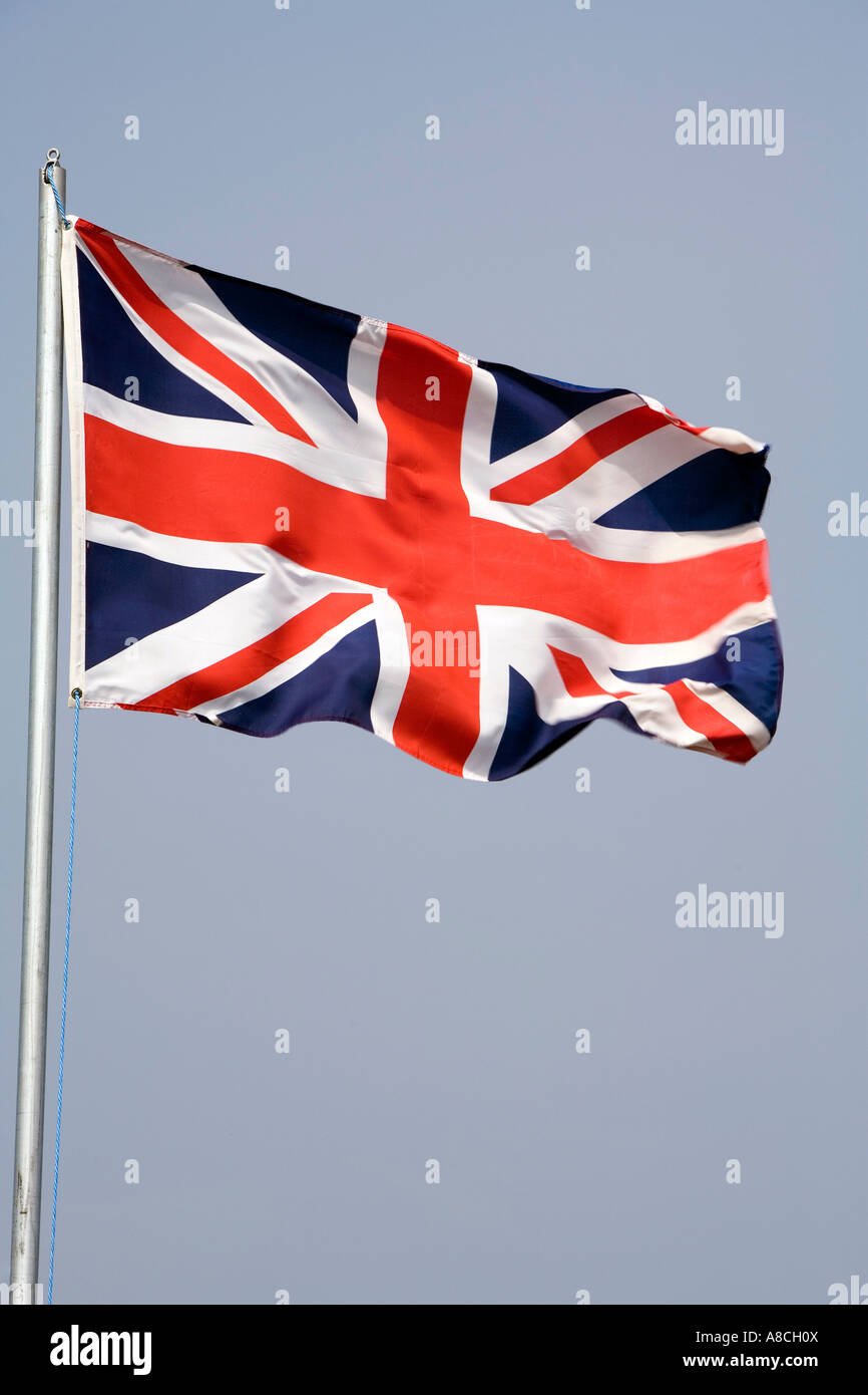 nationality British Union Jack flag flying in strong wind Stock Photo ...