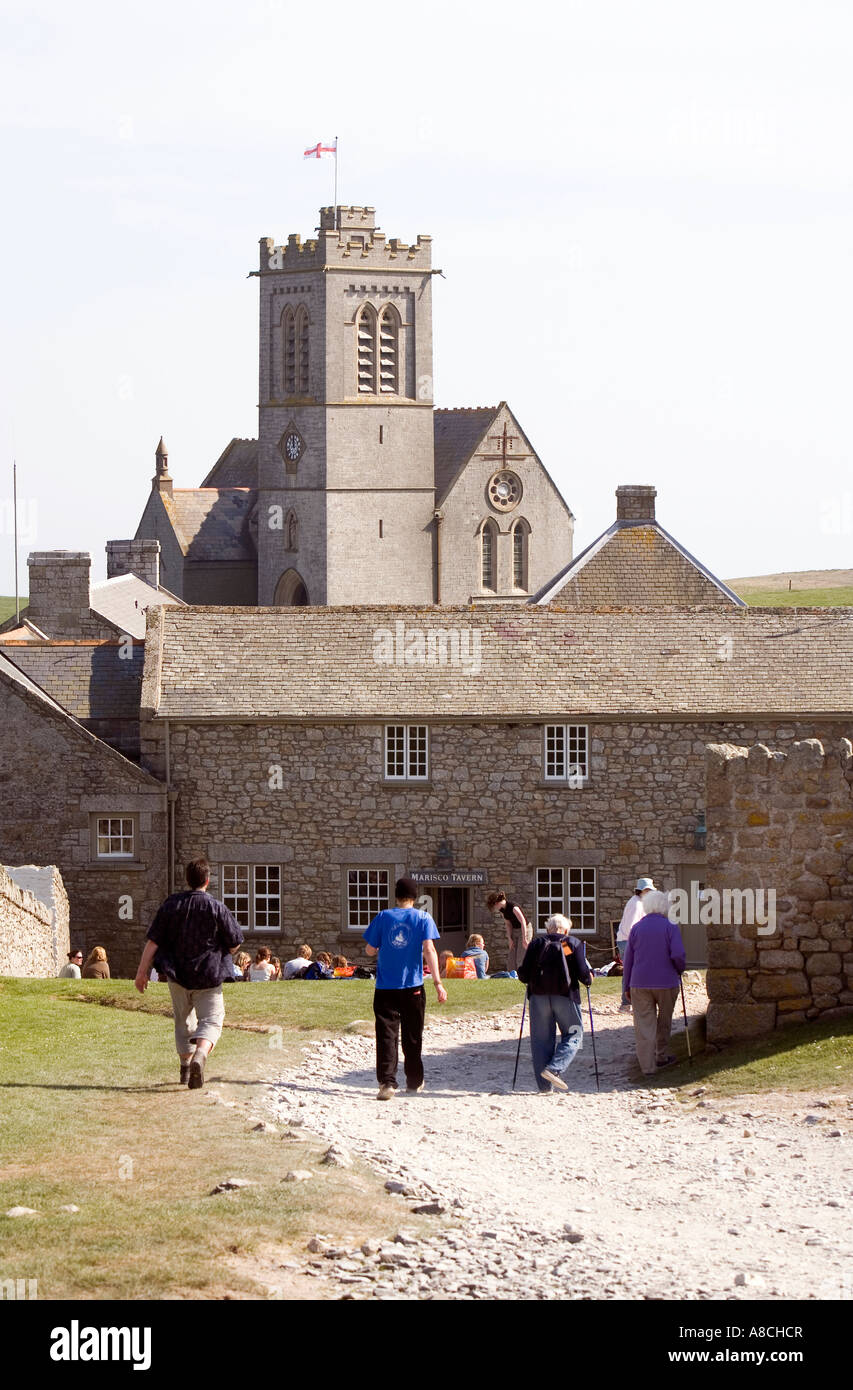 UK Lundy Island people walking in sunshine to Marisco Tavern Stock ...