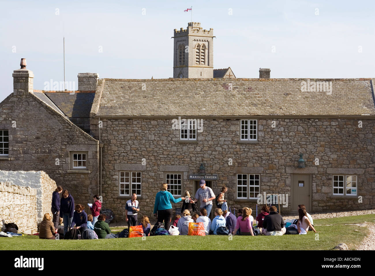 UK Lundy Island people in sunshine outside Marisco Tavern Stock Photo ...
