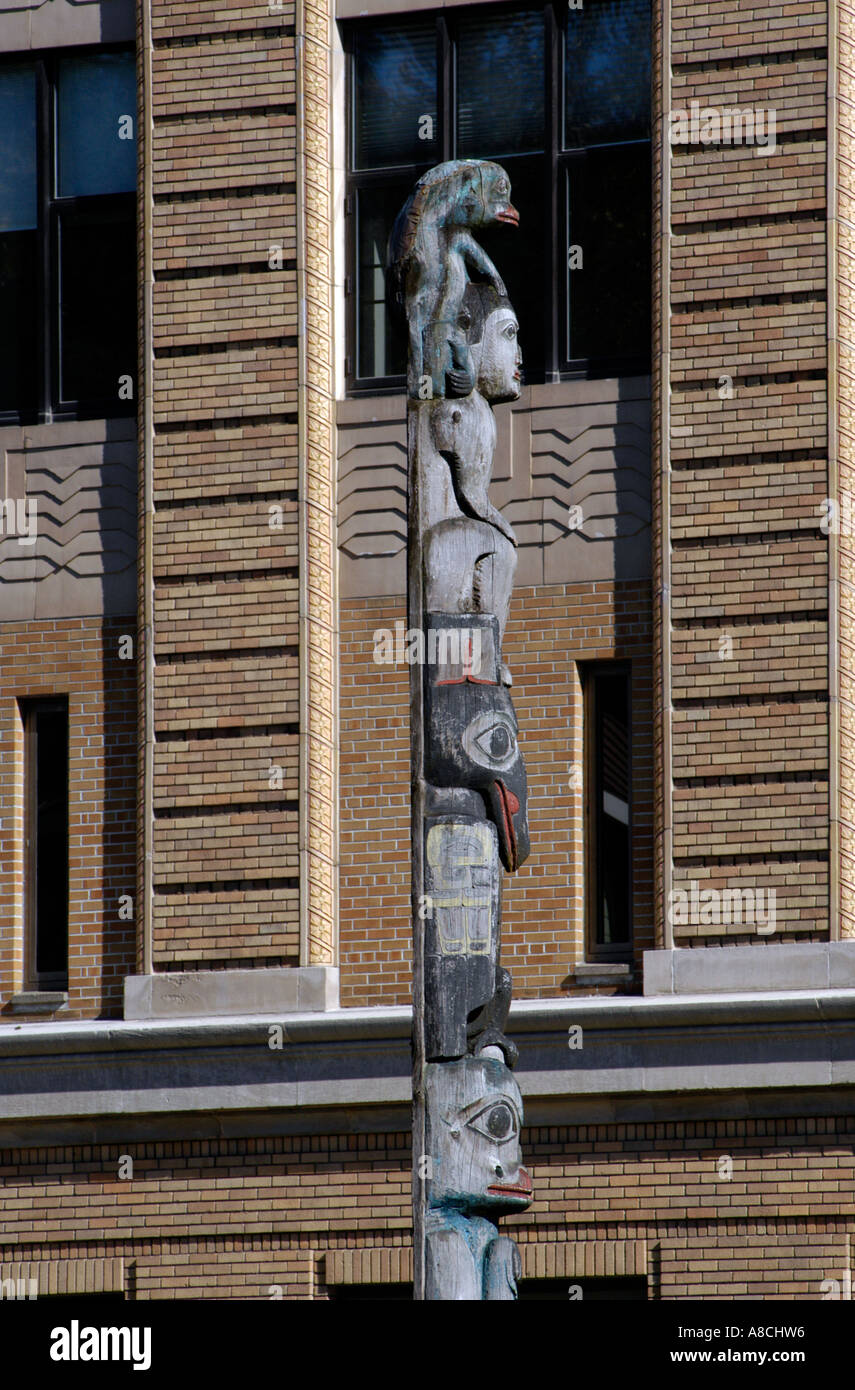 Totem pole with building in background Juneau Alaska United States ...
