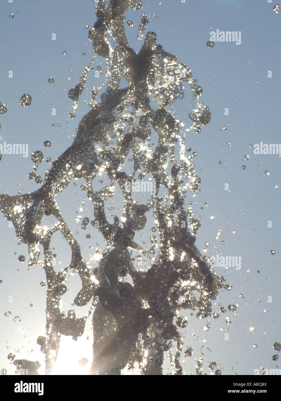 Backlit water drops from spray hi-res stock photography and images - Alamy