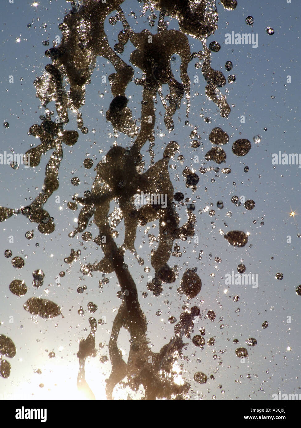Backlit water drops from spray hi-res stock photography and images - Alamy
