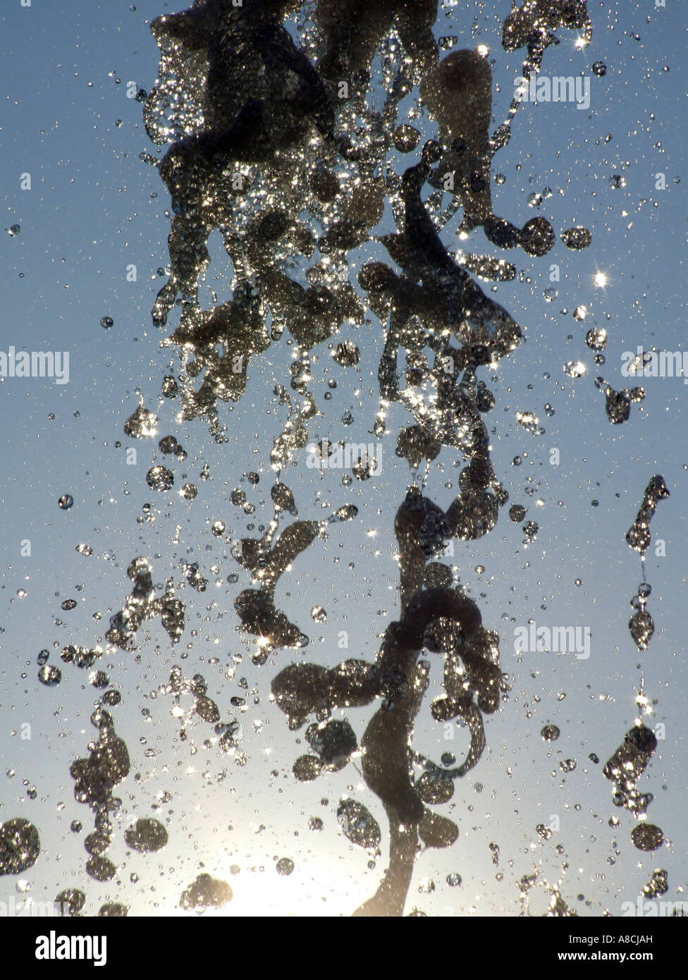 Backlit water drops from spray hi-res stock photography and images - Alamy