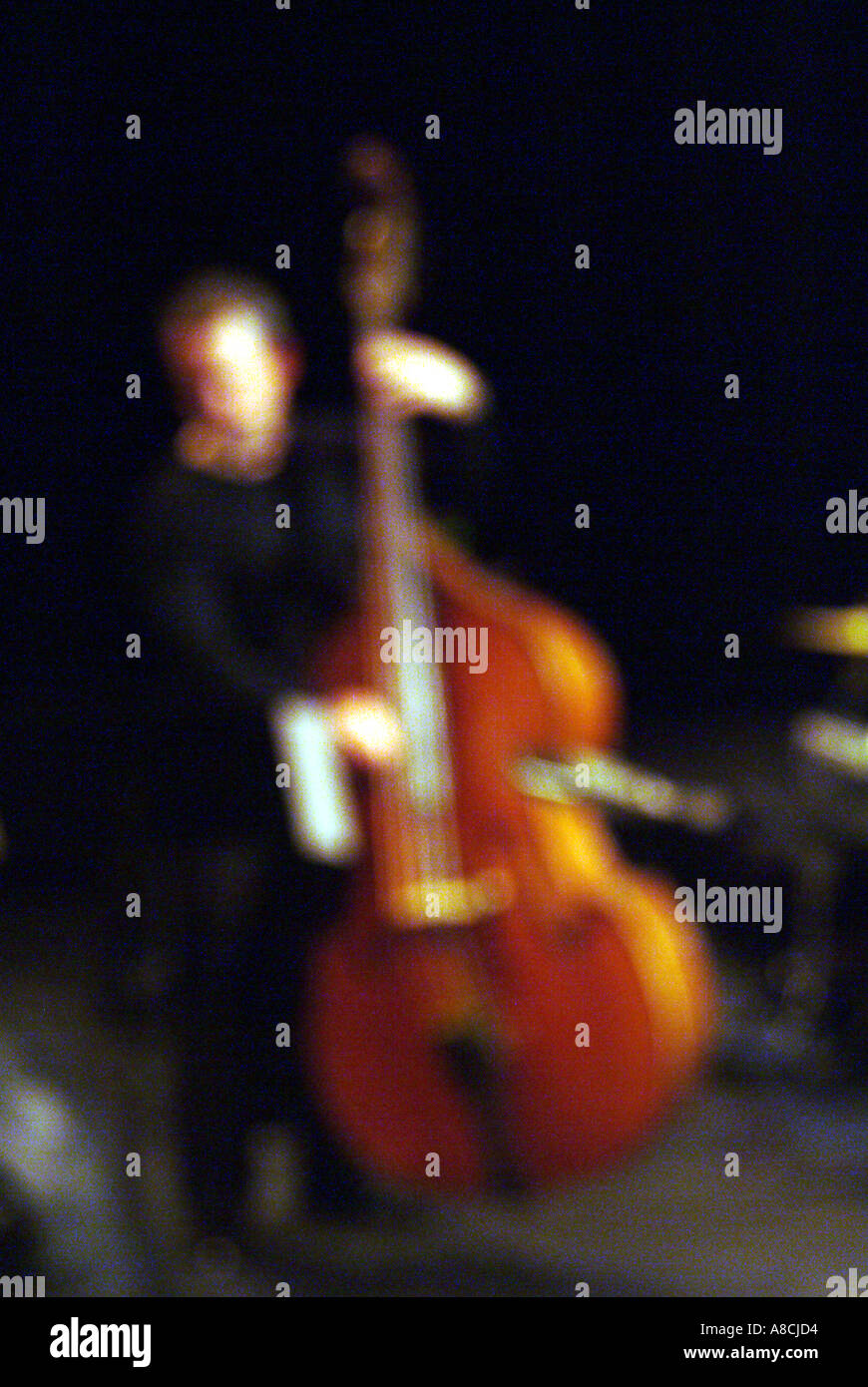 out of focus double bass jazz player Stock Photo - Alamy