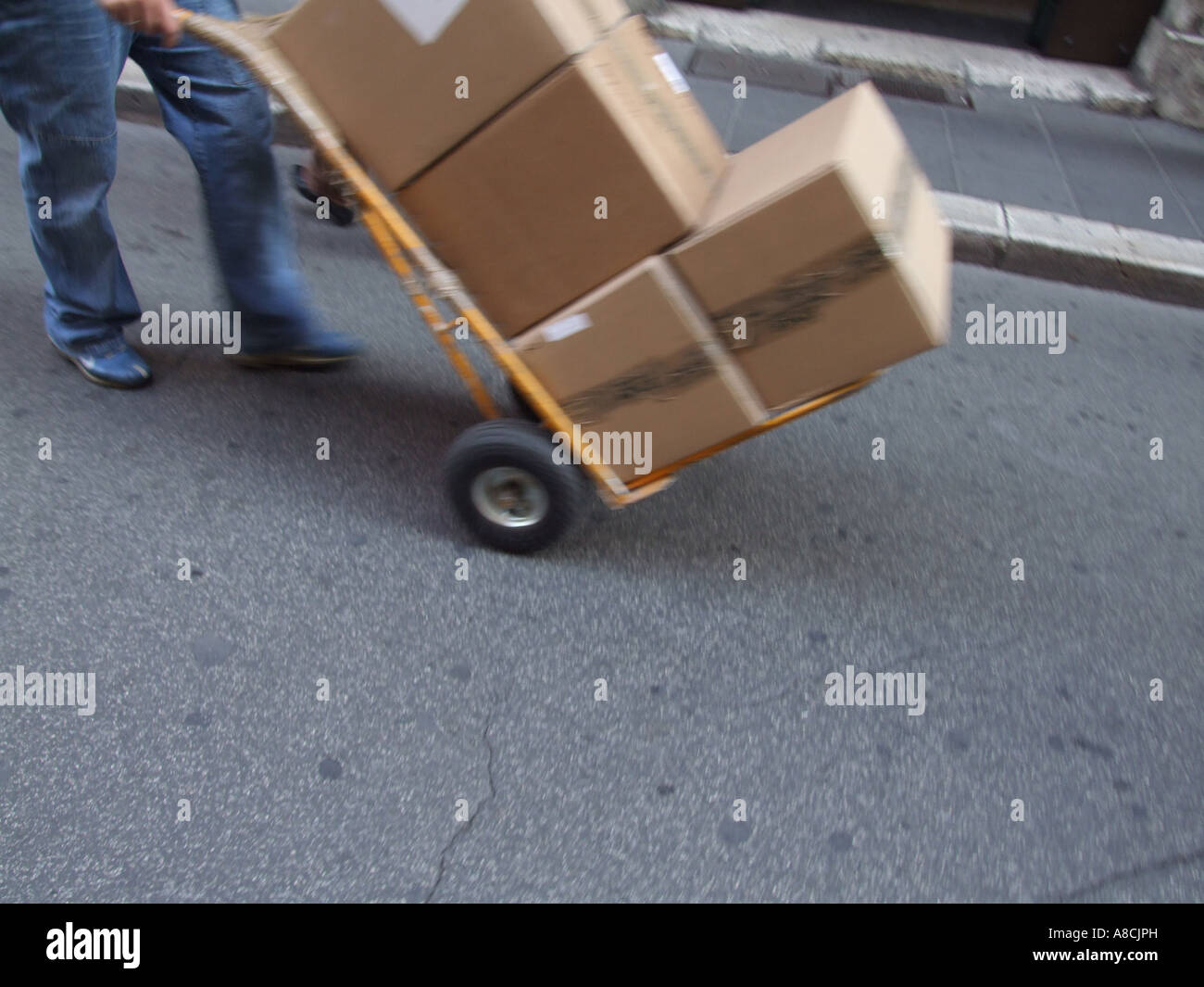 goods delivery man Stock Photo - Alamy