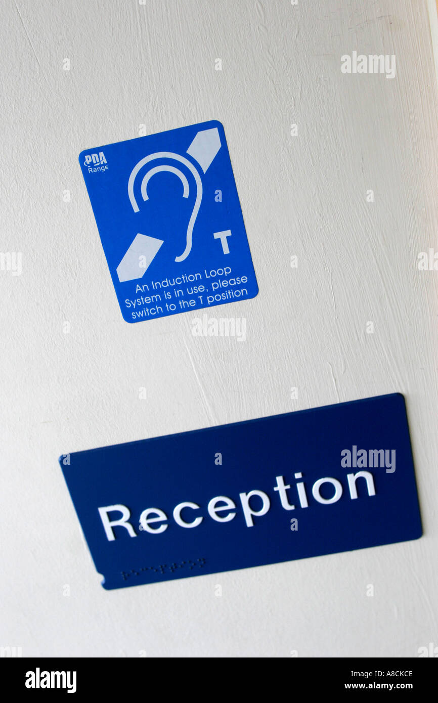 Reception sign Induction loop system sign Stock Photo - Alamy