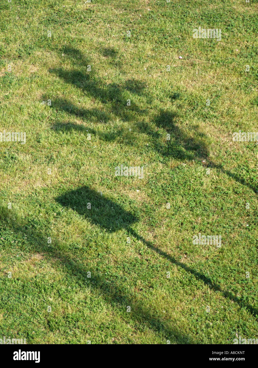 sign shadow in grass Stock Photo - Alamy