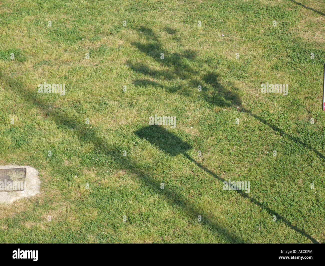 sign shadow in grass Stock Photo - Alamy