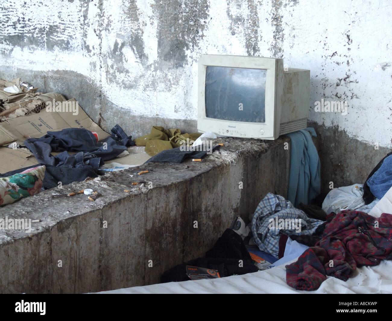 bed of homeless person under bridge Stock Photo - Alamy