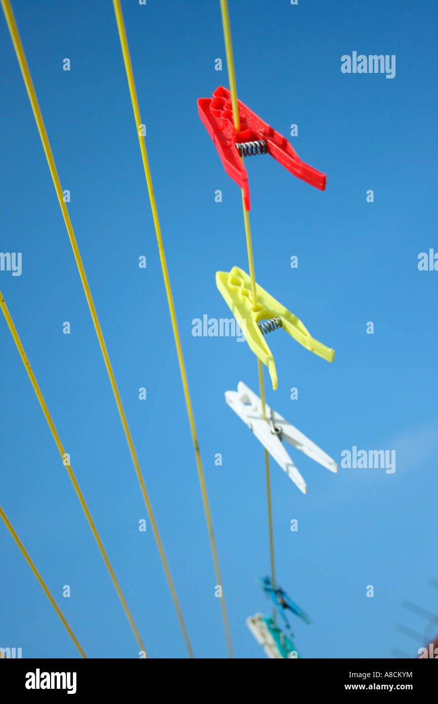line of clothes pegs Stock Photo - Alamy