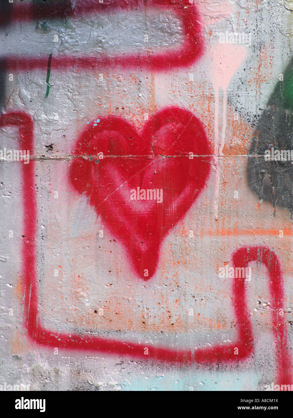 red heart painted on wall Stock Photo - Alamy