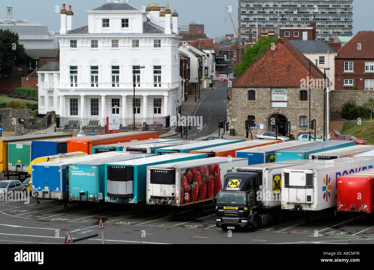 Trucks lorries and trailers wait transportation by Red Funnel ferry to ...