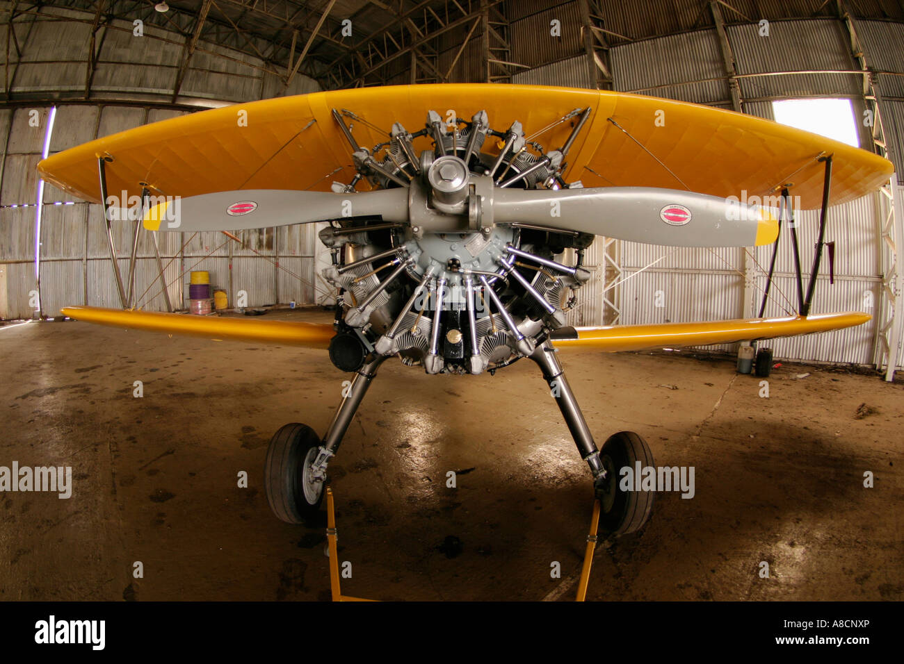 Boeing Stearman biplane in a hangar taken with fisheye lens Stock Photo ...
