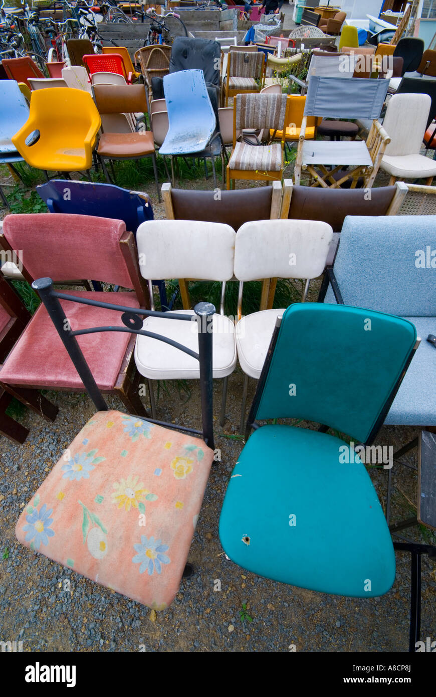 A collection of old chairs at a recycling depot Stock Photo - Alamy