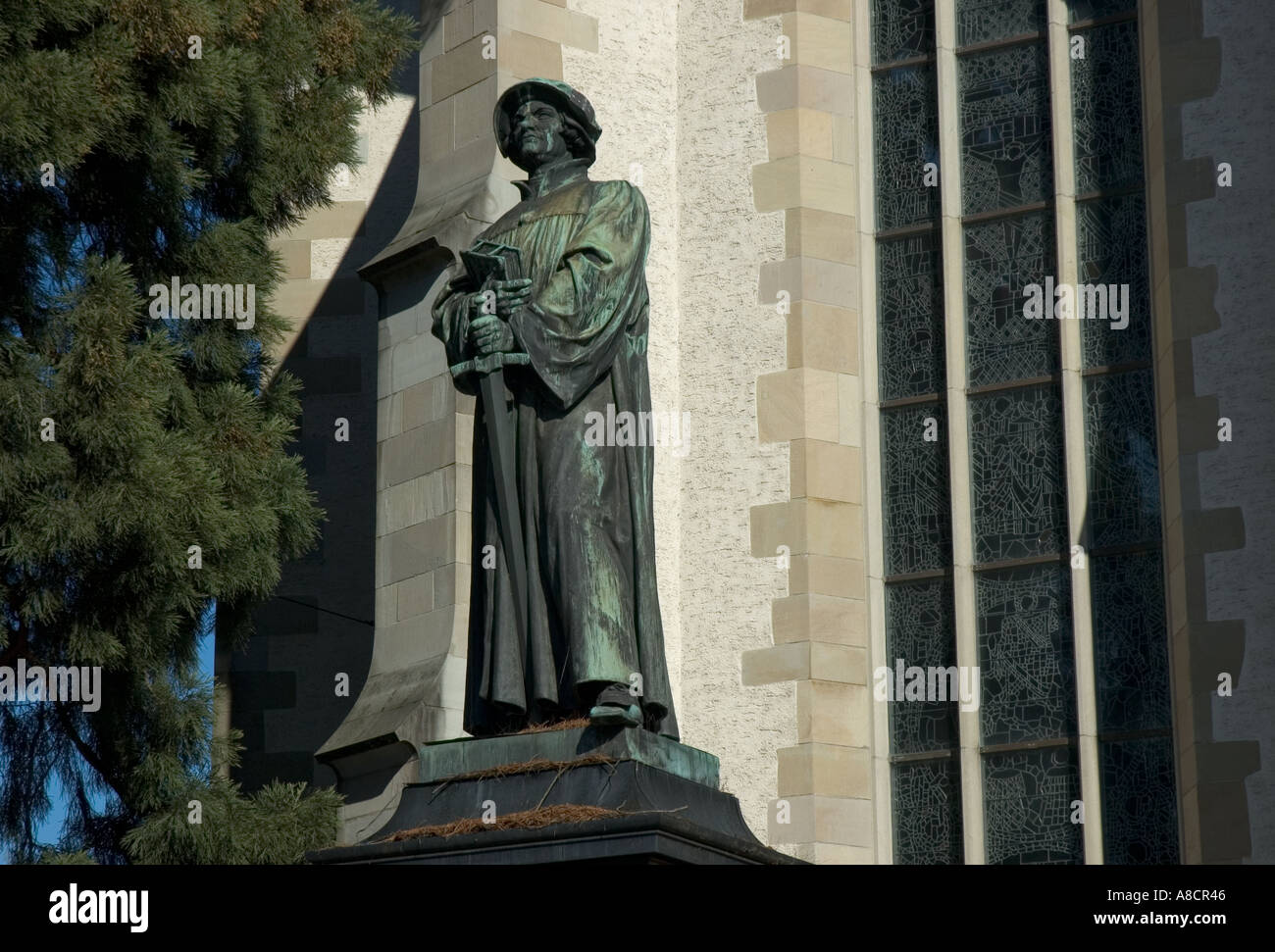 The statue of Ulrich Zwingli in the beautiful city of Zurich in ...